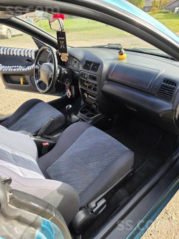 Green Mazda 323 1997 in Aluksne, with an engine capacity of 1.50 L and mileage of 291 thousand km for 1650 €, photo 11 on AUTOMOTO.COM.LV