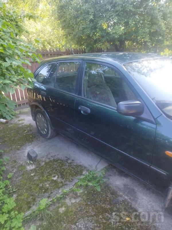 Green Mazda 323 1999 in Riga, with an engine capacity of 2.00 L and mileage of 345 thousand km for 435 €, photo 2 on AUTOMOTO.COM.LV