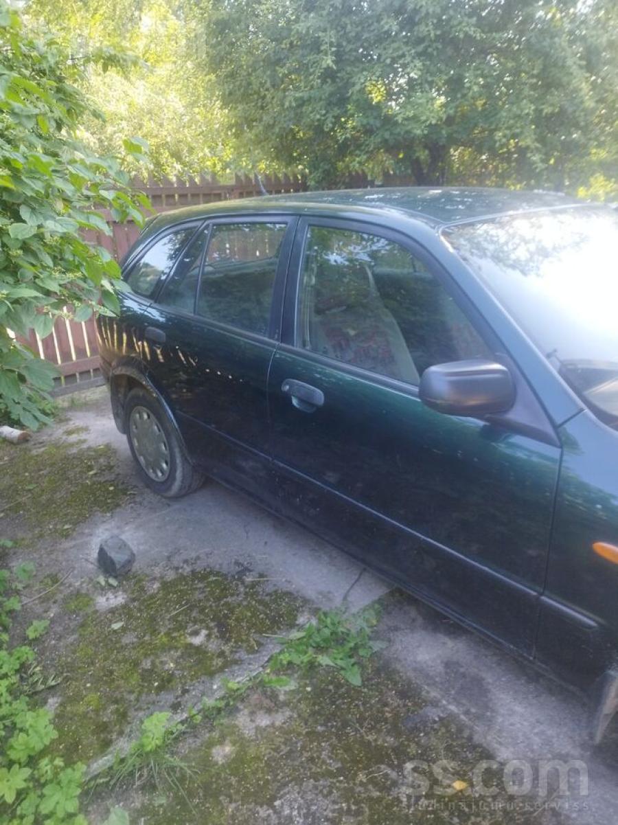 Green Mazda 323 1999 in Riga, with an engine capacity of 2.00 L and mileage of 345 thousand km for 435 €, photo 3 on AUTOMOTO.COM.LV