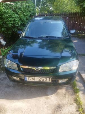 Green Mazda 323 1999 in Riga, with an engine capacity of 2.00 L and mileage of 345 thousand km for 435 €, photo 4 on AUTOMOTO.COM.LV