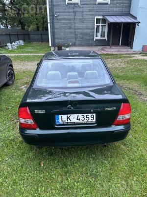 Zaļš Mazda 323 1999 Rīga, ar dzinēja tilpumu 1.50 L un nobraukumu 252 tūkst. km par 1000 €, foto 4 vietnē AUTOMOTO.COM.LV