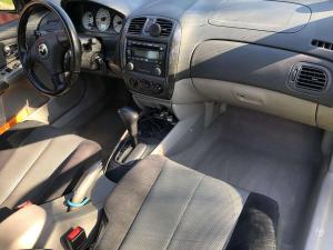 Green Mazda 323 2002 in Vilnius, with an engine capacity of 1.60 L and mileage of 143 thousand km for 600 €, photo 5 on AUTOMOTO.COM.LV