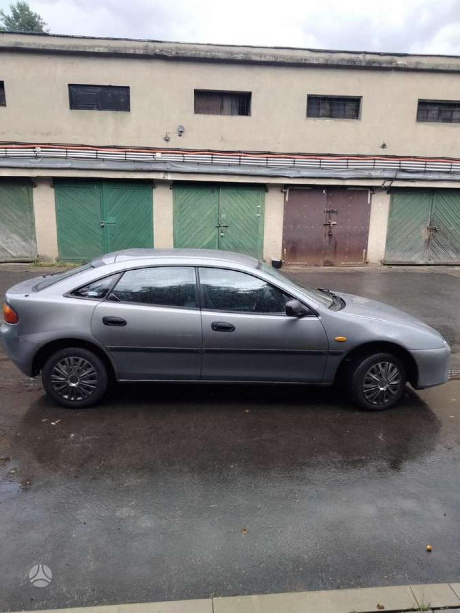 Pelēks Mazda 323 1995 Viļņa, ar dzinēja tilpumu 1.49 L un nobraukumu 290 tūkst. km par 1600 €, foto 3 vietnē AUTOMOTO.COM.LV
