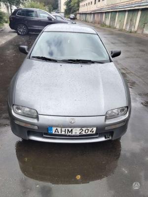 Pelēks Mazda 323 1995 Viļņa, ar dzinēja tilpumu 1.49 L un nobraukumu 290 tūkst. km par 1600 €, foto 5 vietnē AUTOMOTO.COM.LV