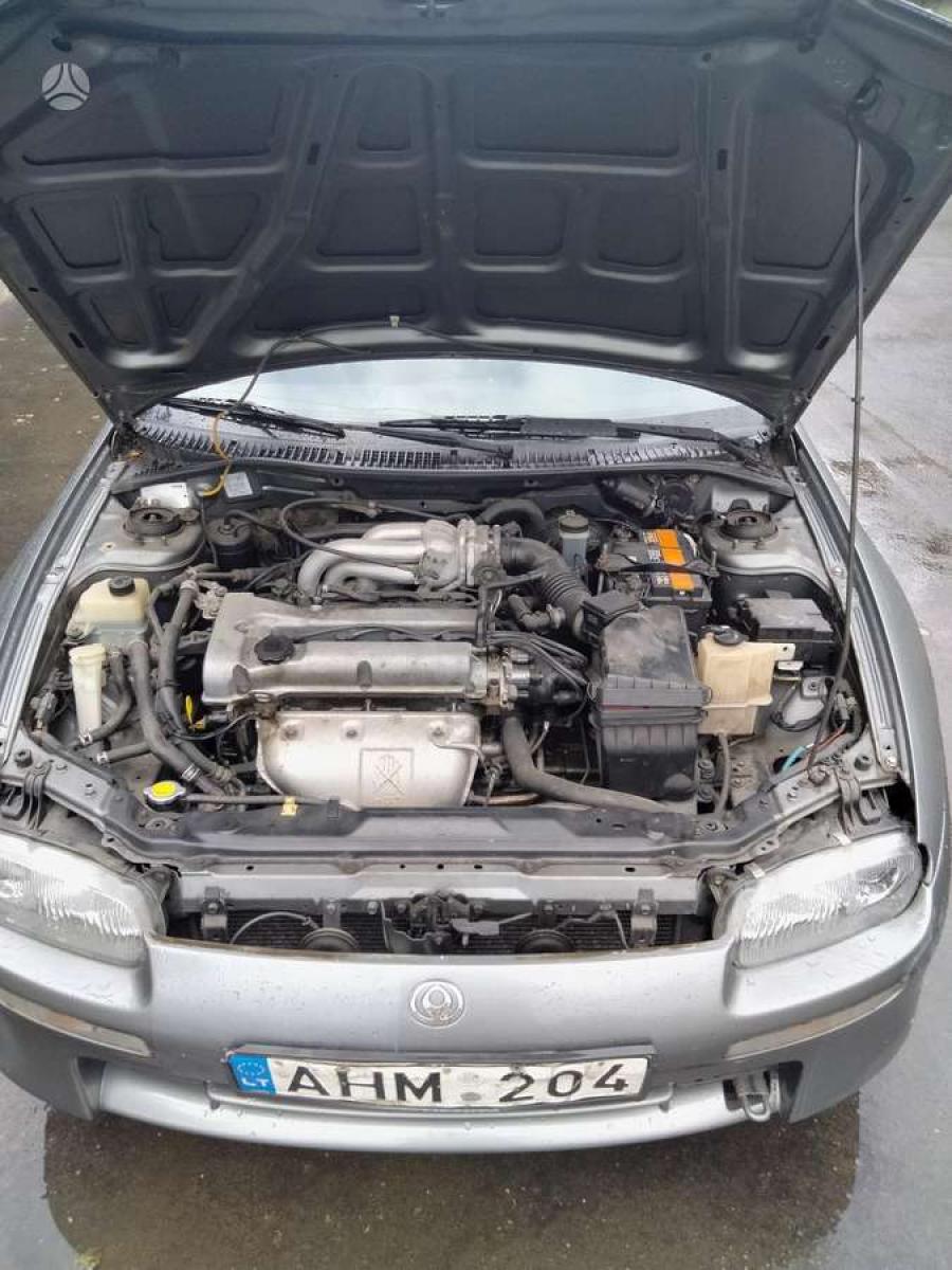 Pelēks Mazda 323 1995 Viļņa, ar dzinēja tilpumu 1.49 L un nobraukumu 290 tūkst. km par 1600 €, foto 7 vietnē AUTOMOTO.COM.LV