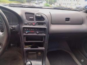 Pelēks Mazda 323 1995 Viļņa, ar dzinēja tilpumu 1.49 L un nobraukumu 290 tūkst. km par 1600 €, foto 8 vietnē AUTOMOTO.COM.LV