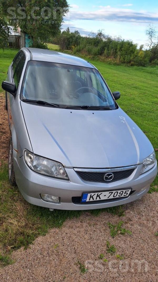 Pelēks Mazda 323 2000 Cēsis, ar dzinēja tilpumu 1.50 L un nobraukumu 195 tūkst. km par 700 €, foto 1 vietnē AUTOMOTO.COM.LV