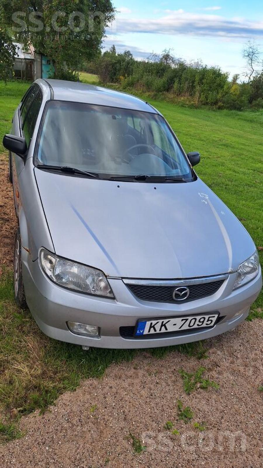 Pelēks Mazda 323 2000 Cēsis, ar dzinēja tilpumu 1.50 L un nobraukumu 195 tūkst. km par 700 €, foto 1 vietnē AUTOMOTO.COM.LV