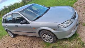 Pelēks Mazda 323 2000 Cēsis, ar dzinēja tilpumu 1.50 L un nobraukumu 195 tūkst. km par 700 €, foto 5 vietnē AUTOMOTO.COM.LV