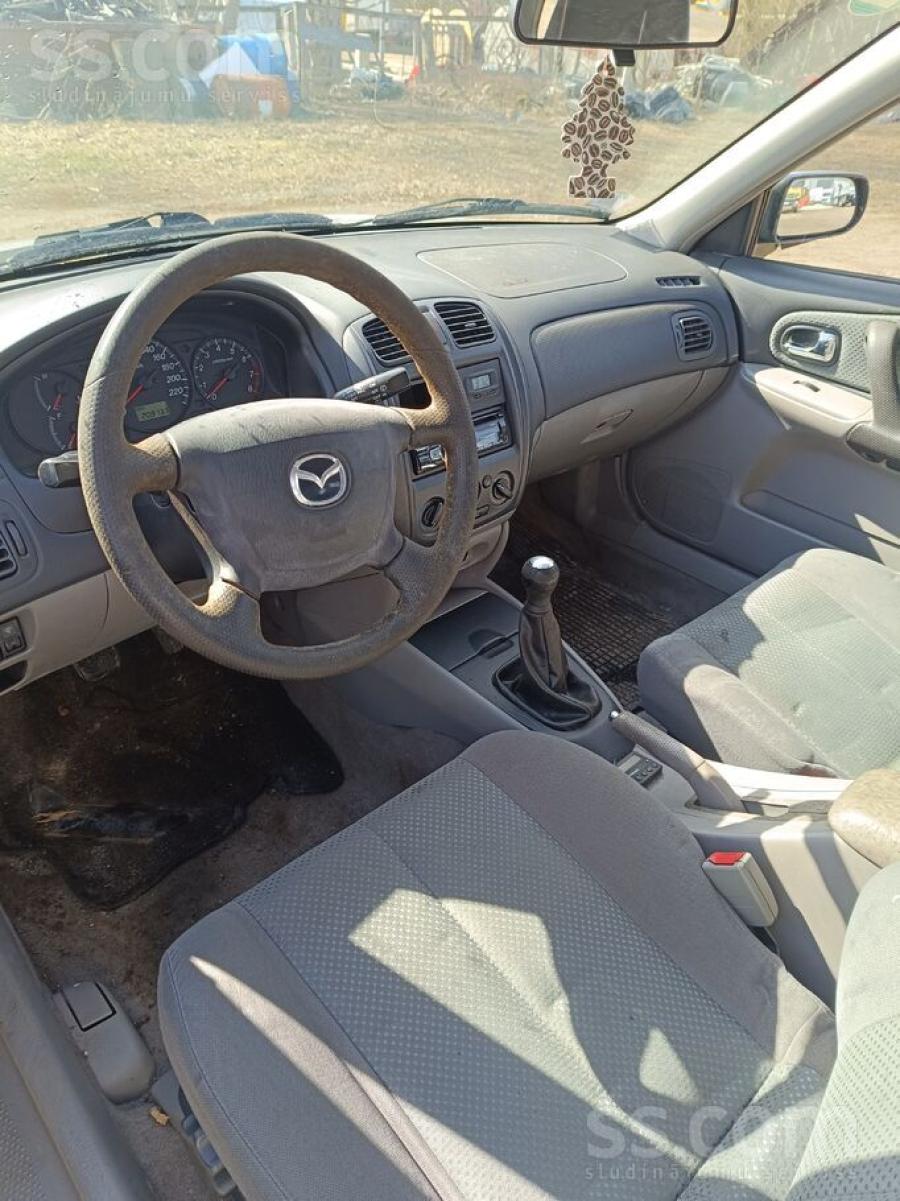 Mazda 323 2001 in Riga, with an engine capacity of 1.60 L and mileage of 209 thousand km for 500 €, photo 9 on AUTOMOTO.COM.LV