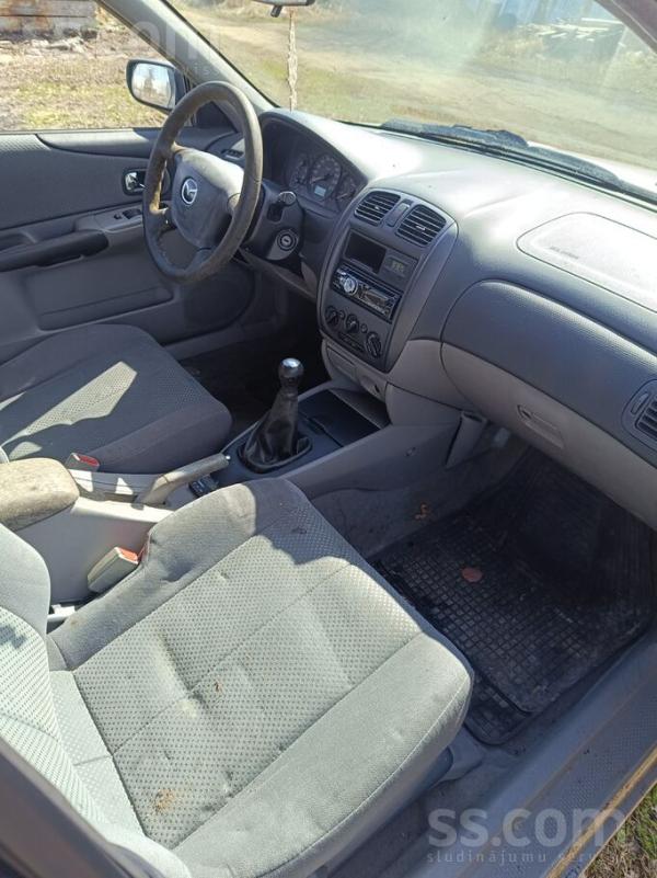 Mazda 323 2001 Rīga, ar dzinēja tilpumu 1.60 L un nobraukumu 209 tūkst. km par 500 €, foto 9 vietnē AUTOMOTO.COM.LV