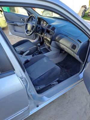 Mazda 323 2002 in Vilnius, with an engine capacity of 4.60 L and mileage of 96 thousand km for 1850 €, photo 14 on AUTOMOTO.COM.LV