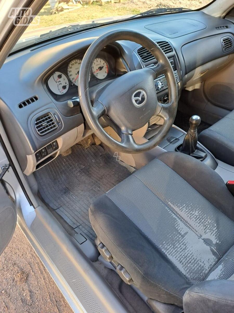 Mazda 323 2002 in Vilnius, with an engine capacity of 4.60 L and mileage of 96 thousand km for 1850 €, photo 16 on AUTOMOTO.COM.LV