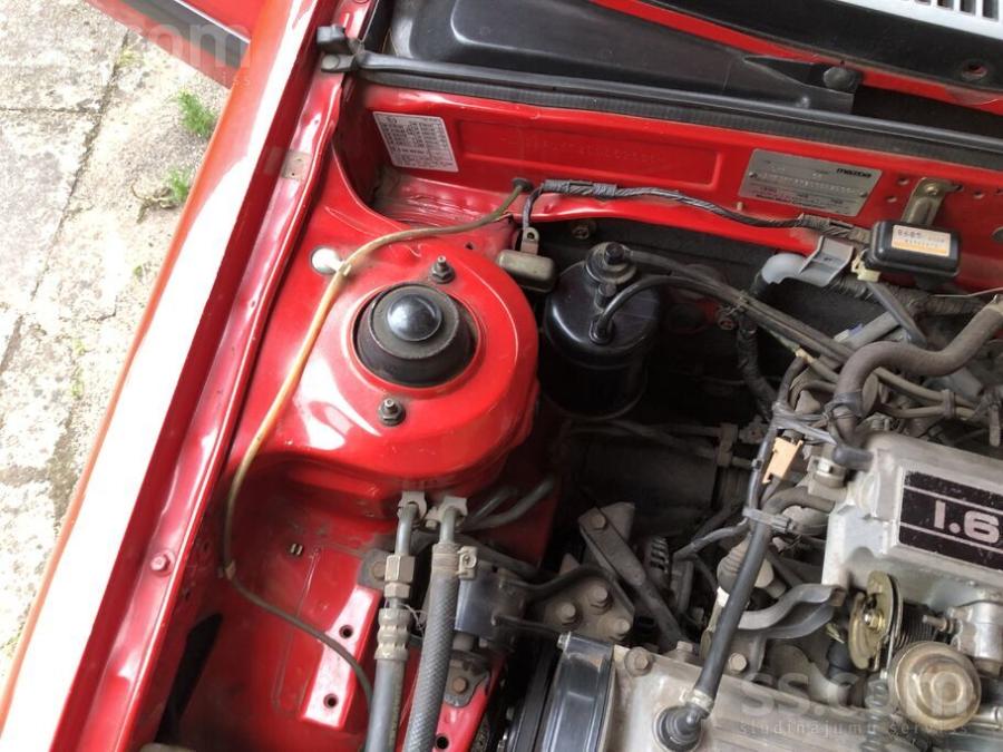 Red Mazda 323 1989 in Cesis, with an engine capacity of 1.60 L and mileage of 211 thousand km for 3500 €, photo 12 on AUTOMOTO.COM.LV
