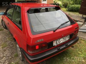 Red Mazda 323 1989 in Cesis, with an engine capacity of 1.60 L and mileage of 211 thousand km for 3500 €, photo 15 on AUTOMOTO.COM.LV