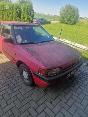 Red Mazda 323 1991 in Kaunas, with an engine capacity of 1.60 L and mileage of 0 thousand km for 300 €, photo 4 on AUTOMOTO.COM.LV