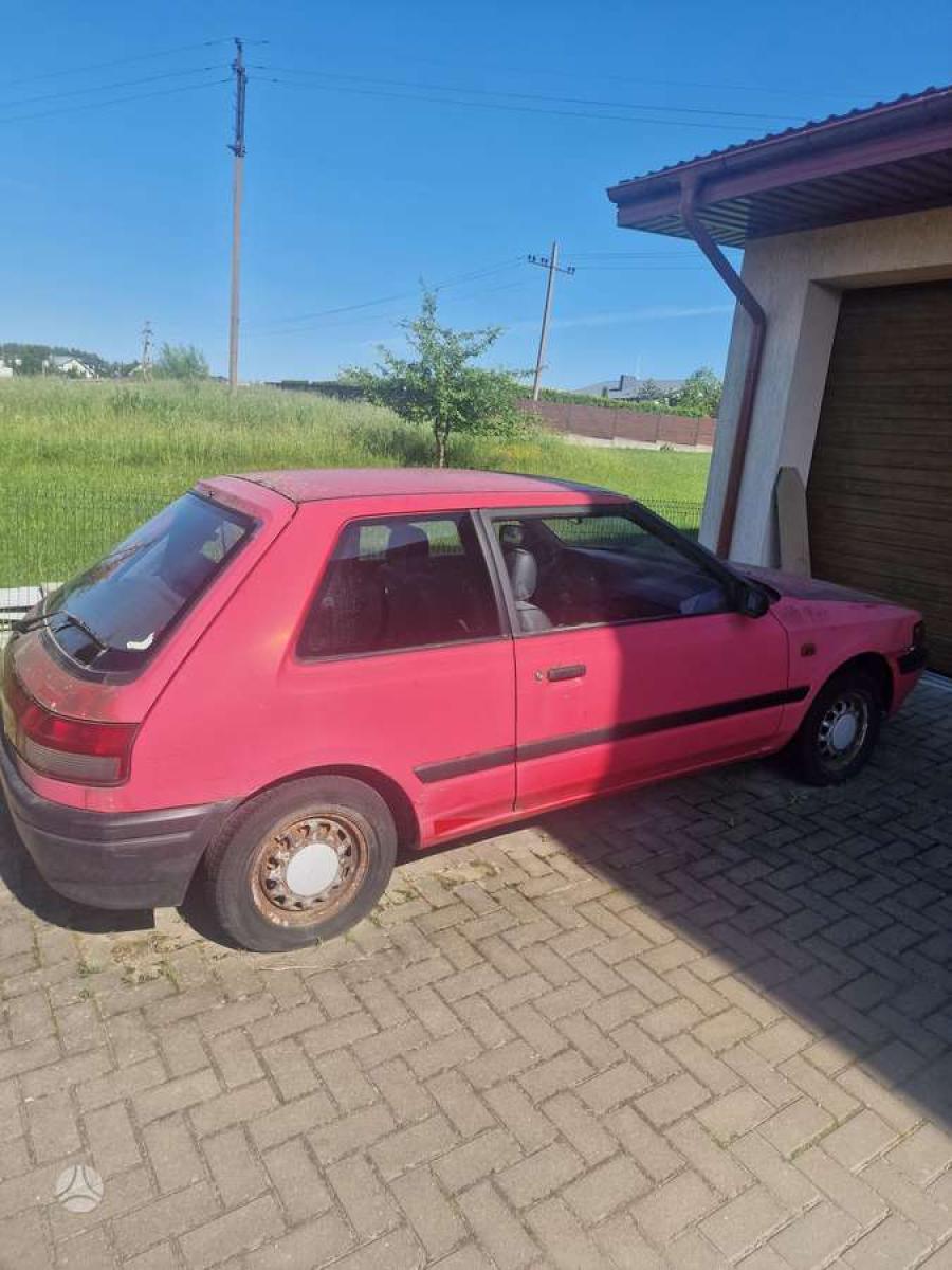 Red Mazda 323 1991 in Kaunas, with an engine capacity of 1.60 L and mileage of 0 thousand km for 300 €, photo 5 on AUTOMOTO.COM.LV