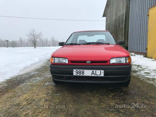 Red Mazda 323 1993 in Tallinn, with an engine capacity of 1.30 L and mileage of 171 thousand km for 2499 €, photo 2 on AUTOMOTO.COM.LV