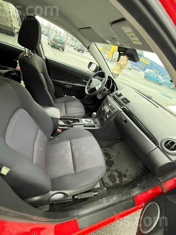Red Mazda 323 2006 in Jekabpils, with an engine capacity of 1.60 L and mileage of 232 thousand km for 850 €, photo 2 on AUTOMOTO.COM.LV
