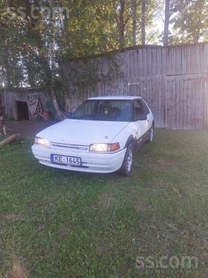Balts Mazda 323 1993 Ogre, ar dzinēja tilpumu 1.30 L un nobraukumu 250 tūkst. km par 300 €, foto  vietnē AUTOMOTO.COM.LV