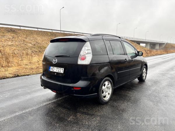 Black Mazda 5 2006 in Ogre, with an engine capacity of 2.00 L and mileage of 388 thousand km for 1400 €, photo 4 on AUTOMOTO.COM.LV