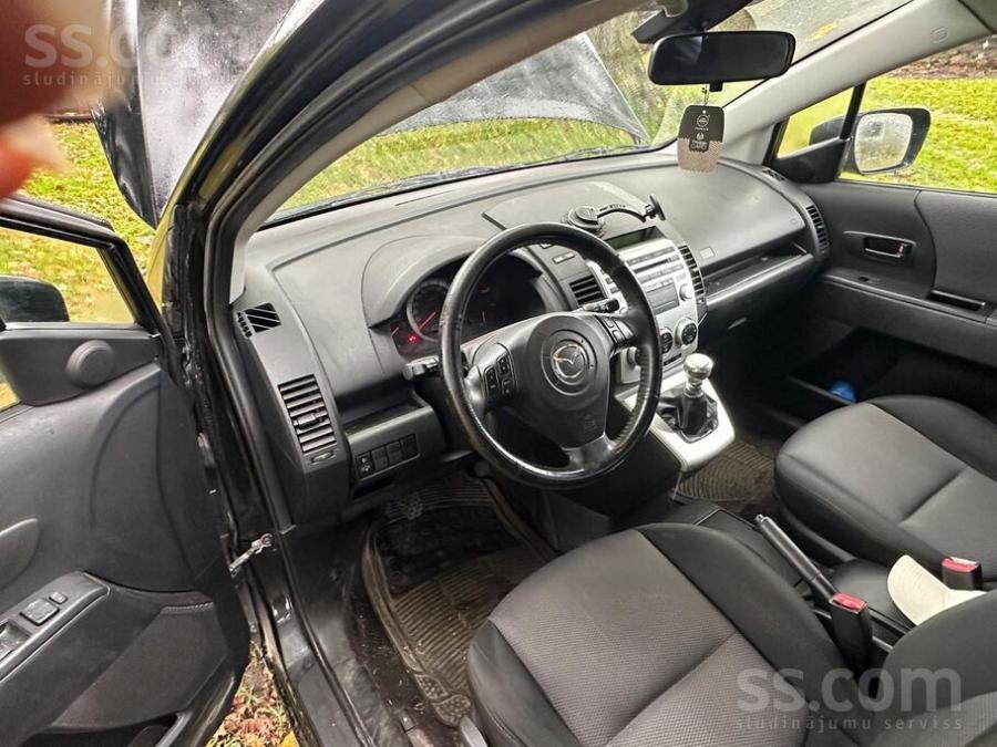 Black Mazda 5 2007 in Liepaja, with an engine capacity of 2.00 L and mileage of 206 thousand km for 1500 €, photo 4 on AUTOMOTO.COM.LV