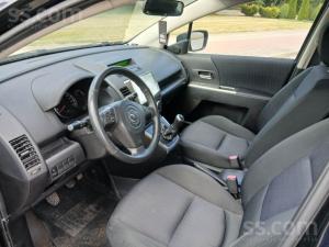 Melns Mazda 5 2010 Liepāja, ar dzinēja tilpumu 2.00 L un nobraukumu 115 tūkst. km par 2700 €, foto  vietnē AUTOMOTO.COM.LV