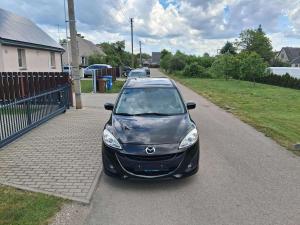 Black Mazda 5 2011 in Marijampole, with an engine capacity of 1.56 L and mileage of 237 thousand km for 3950 €, photo 4 on AUTOMOTO.COM.LV