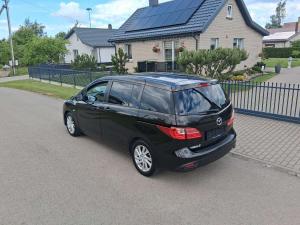 Black Mazda 5 2011 in Marijampole, with an engine capacity of 1.56 L and mileage of 237 thousand km for 3950 €, photo 6 on AUTOMOTO.COM.LV