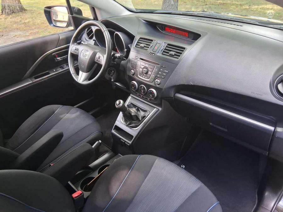 Black Mazda 5 2011 in Marijampole, with an engine capacity of 1.56 L and mileage of 237 thousand km for 3950 €, photo 18 on AUTOMOTO.COM.LV