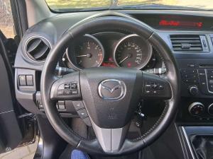 Black Mazda 5 2011 in Marijampole, with an engine capacity of 1.56 L and mileage of 237 thousand km for 3950 €, photo 24 on AUTOMOTO.COM.LV