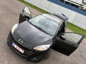 Melns Mazda 5 2012 Daugavpils, ar dzinēja tilpumu 1.60 L un nobraukumu 275 tūkst. km par 3450 €, foto 35 vietnē AUTOMOTO.COM.LV