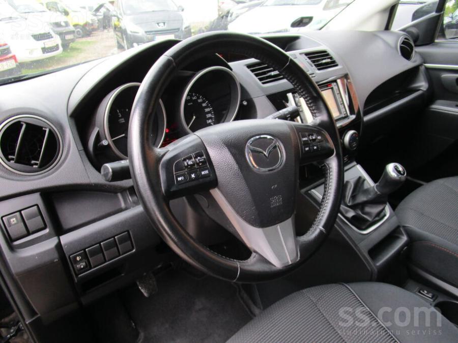 Black Mazda 5 2013 in Daugavpils, with an engine capacity of 1.60 L and mileage of 190 thousand km for 3990 €, photo 12 on AUTOMOTO.COM.LV