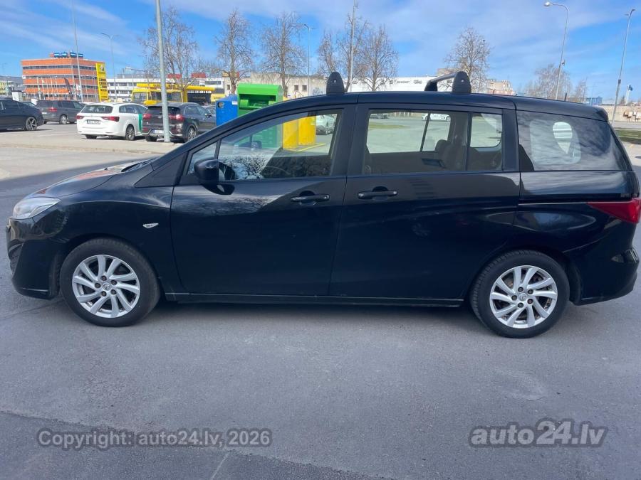 Black Mazda 5 2011 in Tallinn, with an engine capacity of 1.60 L and mileage of 310 thousand km for 2999 €, photo 3 on AUTOMOTO.COM.LV