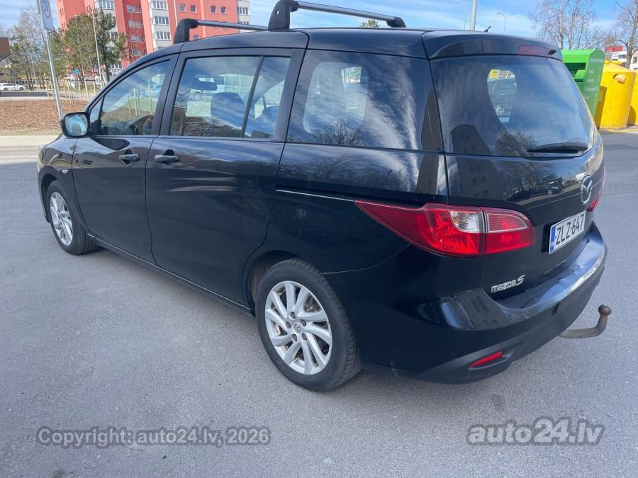 Black Mazda 5 2011 in Tallinn, with an engine capacity of 1.60 L and mileage of 310 thousand km for 2999 €, photo 4 on AUTOMOTO.COM.LV