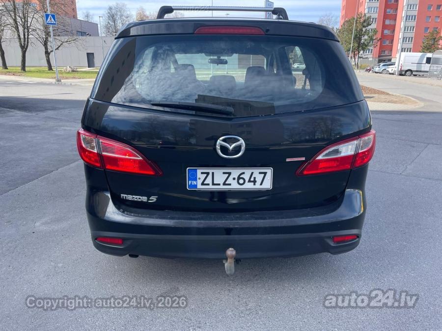 Black Mazda 5 2011 in Tallinn, with an engine capacity of 1.60 L and mileage of 310 thousand km for 2999 €, photo 5 on AUTOMOTO.COM.LV