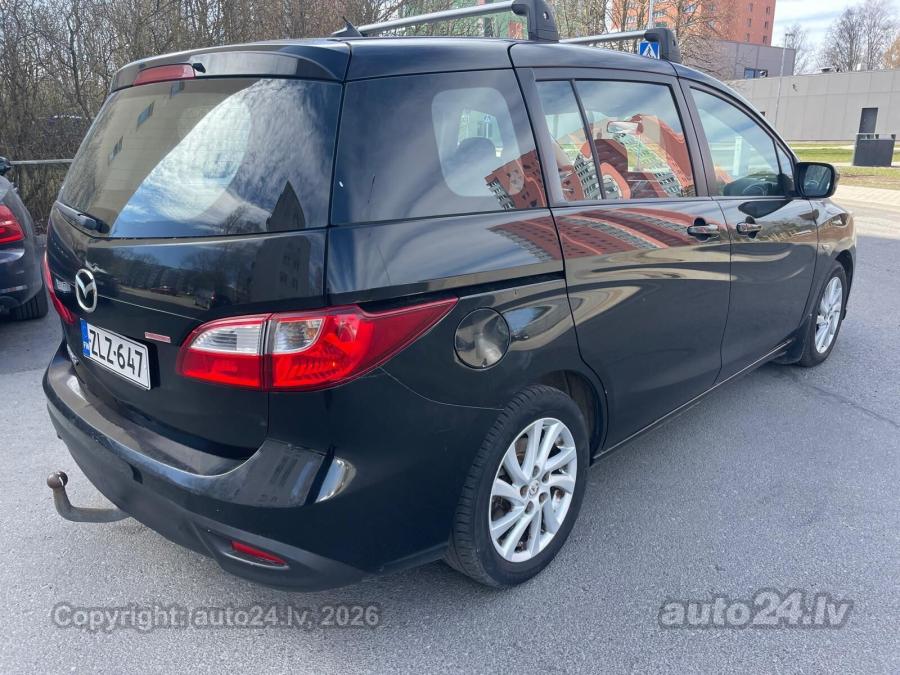 Black Mazda 5 2011 in Tallinn, with an engine capacity of 1.60 L and mileage of 310 thousand km for 2999 €, photo 6 on AUTOMOTO.COM.LV