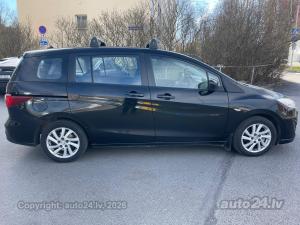 Black Mazda 5 2011 in Tallinn, with an engine capacity of 1.60 L and mileage of 310 thousand km for 2999 €, photo 7 on AUTOMOTO.COM.LV