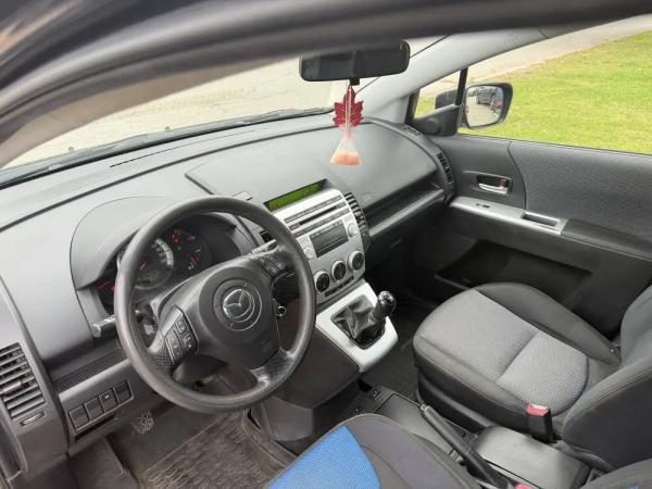 Grey Mazda 5 2006 in Ventspils, with an engine capacity of 2.00 L and mileage of 297 thousand km for 1590 €, photo 10 on AUTOMOTO.COM.LV