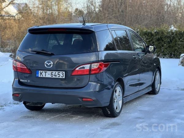 Pelēks Mazda 5 2011 Rīga, ar dzinēja tilpumu 1.60 L un nobraukumu 236 tūkst. km par 3390 €, foto 2 vietnē AUTOMOTO.COM.LV