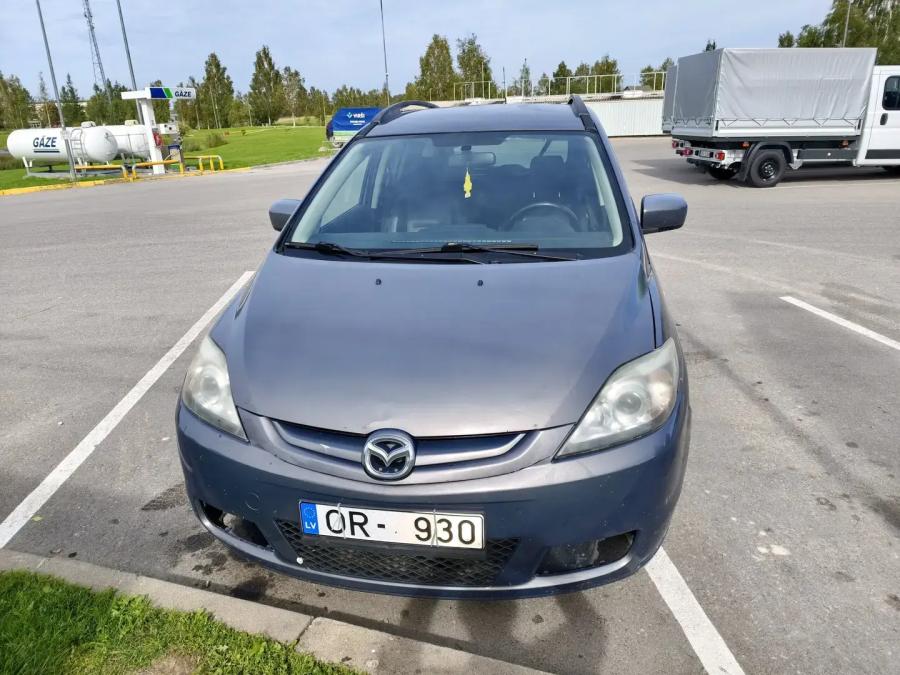 Violet Mazda 5 2008 in Jelgava, with an engine capacity of 2.00 L and mileage of 314 thousand km for 990 €, photo 1 on AUTOMOTO.COM.LV