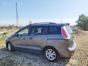 Violets Mazda 5 2009 Rīga, ar dzinēja tilpumu 2.00 L un nobraukumu 235 tūkst. km par 1950 €, foto  vietnē AUTOMOTO.COM.LV