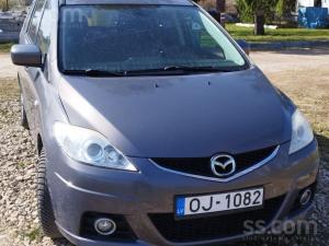 Violets Mazda 5 2009 Rīga, ar dzinēja tilpumu 2.00 L un nobraukumu 235 tūkst. km par 1950 €, foto 14 vietnē AUTOMOTO.COM.LV