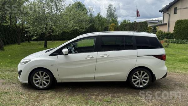 White Mazda 5 2012 in Riga, with an engine capacity of 1.60 L and mileage of 264 thousand km for 4250 €, photo 1 on AUTOMOTO.COM.LV