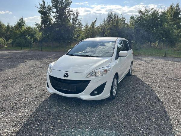 White Mazda 5 2012 in Kretinga, with an engine capacity of 1.56 L and mileage of 228 thousand km for 3950 €, photo 10 on AUTOMOTO.COM.LV