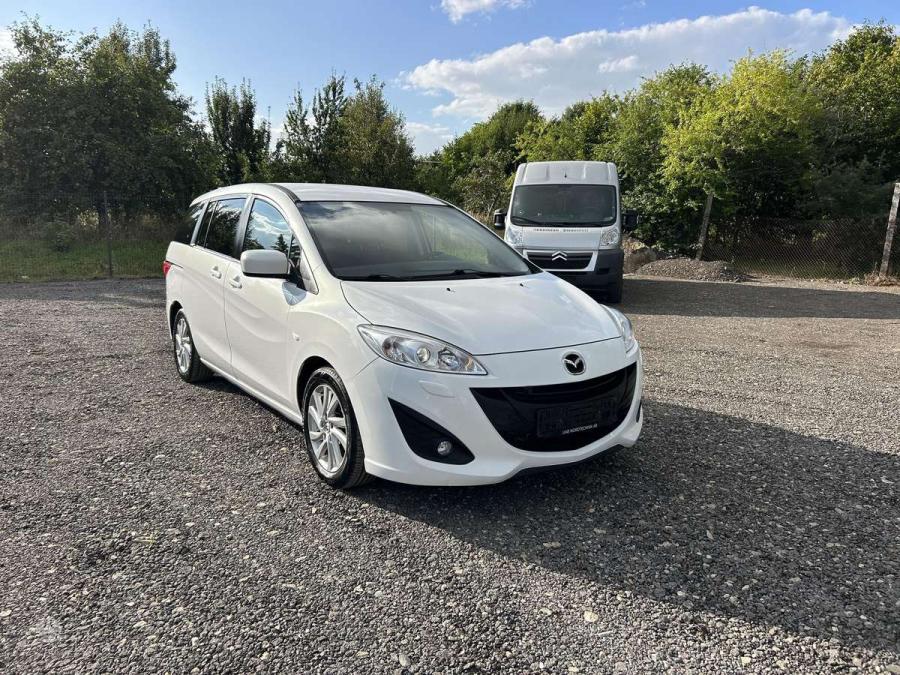 White Mazda 5 2012 in Kretinga, with an engine capacity of 1.56 L and mileage of 228 thousand km for 3950 €, photo 11 on AUTOMOTO.COM.LV