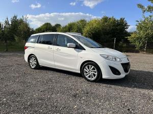 White Mazda 5 2012 in Kretinga, with an engine capacity of 1.56 L and mileage of 228 thousand km for 3950 €, photo 13 on AUTOMOTO.COM.LV