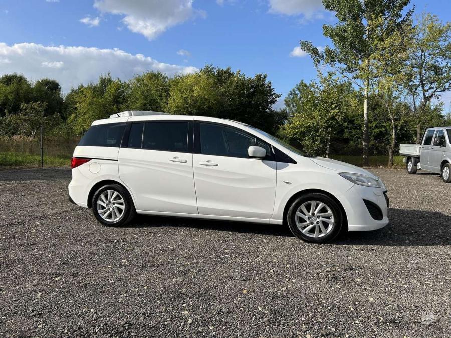 White Mazda 5 2012 in Kretinga, with an engine capacity of 1.56 L and mileage of 228 thousand km for 3950 €, photo 14 on AUTOMOTO.COM.LV