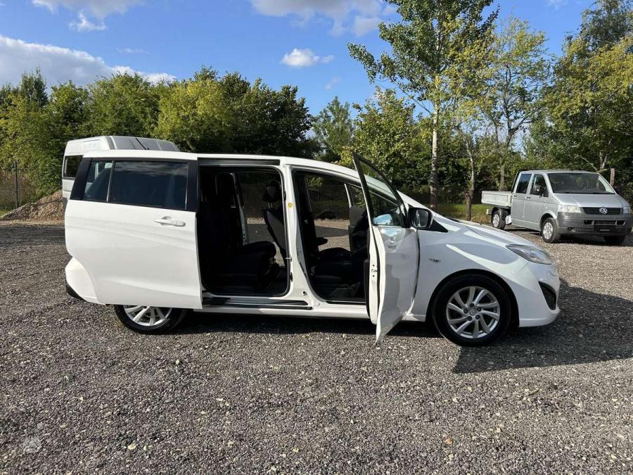 White Mazda 5 2012 in Kretinga, with an engine capacity of 1.56 L and mileage of 228 thousand km for 3950 €, photo 16 on AUTOMOTO.COM.LV