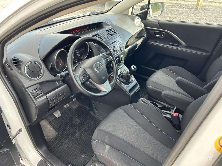 White Mazda 5 2012 in Kretinga, with an engine capacity of 1.56 L and mileage of 228 thousand km for 3950 €, photo 18 on AUTOMOTO.COM.LV